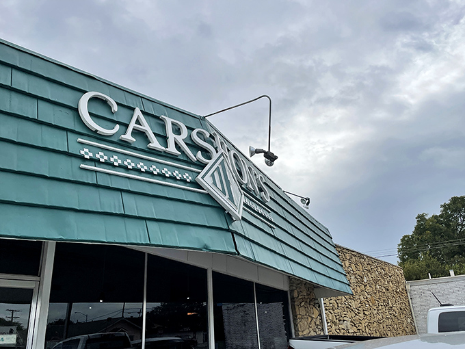 The iconic teal-shingled exterior of Carshon's stands like a beacon of deli goodness against the Texas sky. A Fort Worth treasure hiding in plain sight.