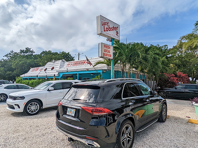 A different angle reveals the restaurant's cheerful exterior and "Fresh Local Seafood" sign &ndash; the Keys equivalent of finding a treasure map.