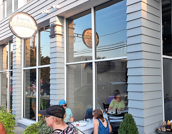The welcoming facade of Henlopen City Oyster House beckons seafood lovers like a lighthouse guiding hungry sailors to shore.