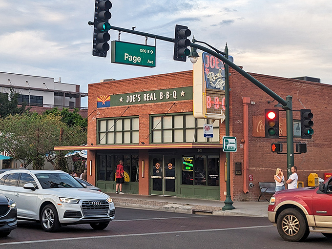 The brick facade of Joe's Real BBQ stands like a barbecue beacon in downtown Gilbert, promising smoky treasures within those hallowed walls.