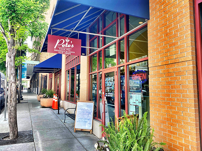 Pete's welcoming storefront with its signature blue awning beckons hungry Knoxville locals and visitors alike. The red-framed windows hint at the warmth waiting inside.