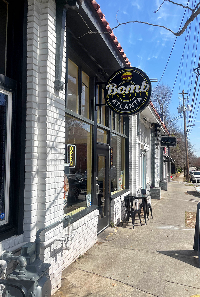 A sidewalk sandwich board hints at the deliciousness waiting inside, while the turquoise door adds a pop of color to this charming Atlanta biscuit haven.