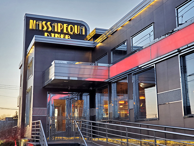 The Massapequa Diner's sleek black and red exterior isn't just eye-catching&mdash;it's a beacon for hungry souls at any hour. Modern architecture meets classic diner comfort.