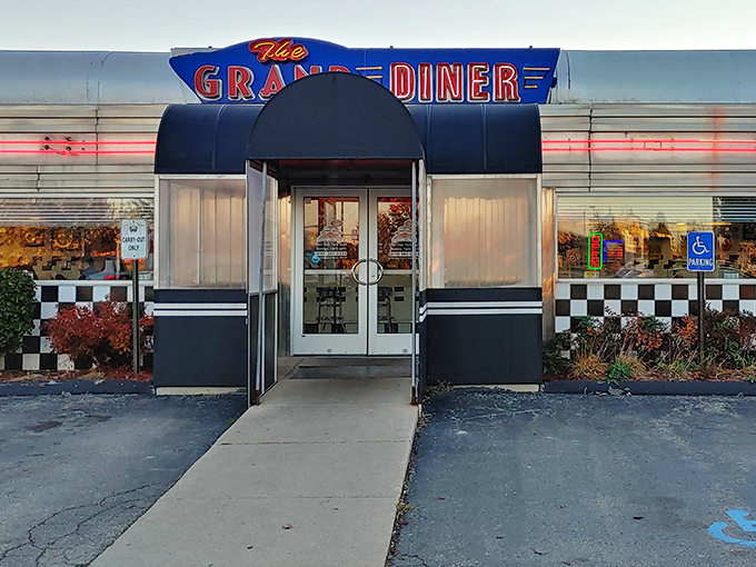 That neon sign isn't just announcing a restaurant&mdash;it's promising a time machine. The classic black and white checkerboard pattern practically screams "comfort food ahead!"