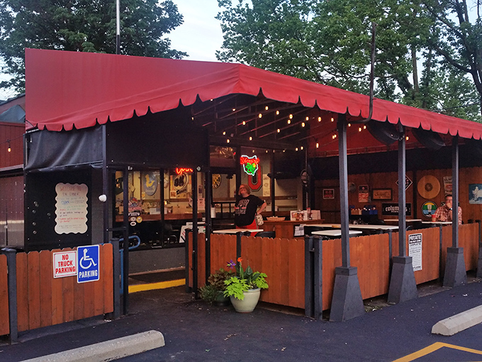 The iconic red awning beckons like a culinary lighthouse, guiding hungry souls to donut paradise in Grandview Heights.