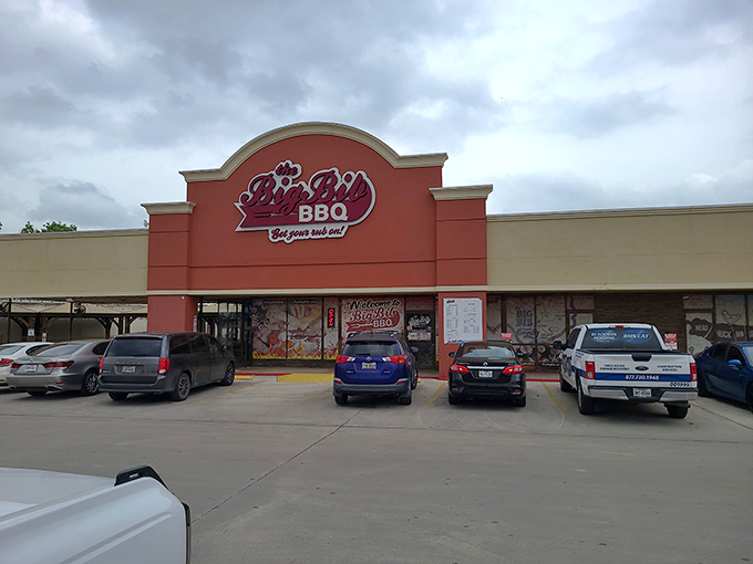 The Big Bib BBQ's bold red storefront stands like a beacon of barbecue hope in the Texas landscape. No fancy frills needed when what's inside smells this good.