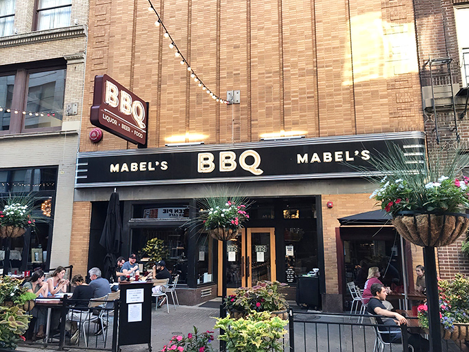 The inviting storefront of Mabel's BBQ on East 4th Street beckons with its classic brick facade and outdoor seating&mdash;a Cleveland meat lover's paradise in disguise.