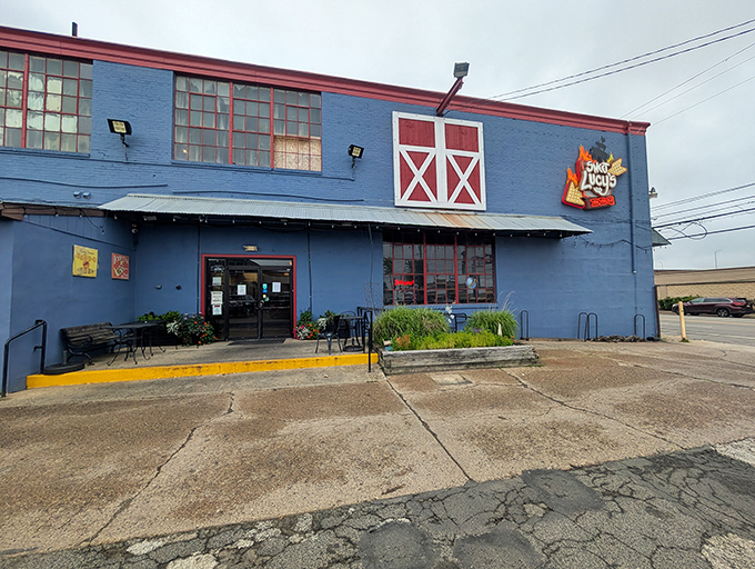 Sweet Lucy's storefront beckons like a smoky siren song, promising meat miracles within those unassuming walls.