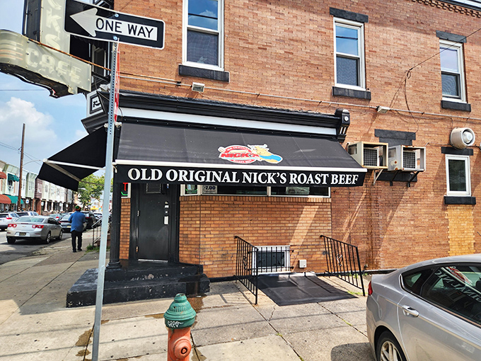 The unassuming brick exterior of Nick's hides Philadelphia's worst-kept culinary secret. Like finding a Picasso at a yard sale.