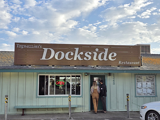 The unassuming seafood sanctuary that proves the best coastal treasures aren't always wrapped in fancy packaging. Tognazzini's Dockside promises authenticity over pretense.