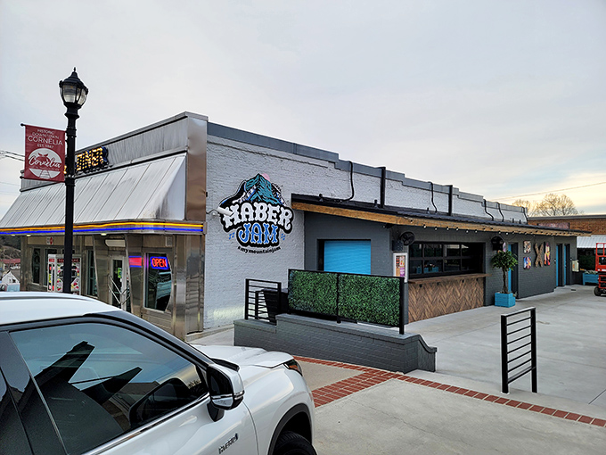 Fenders Diner's classic exterior beckons hungry travelers like a time machine disguised as a restaurant. The white brick fa&ccedil;ade promises retro delights within.