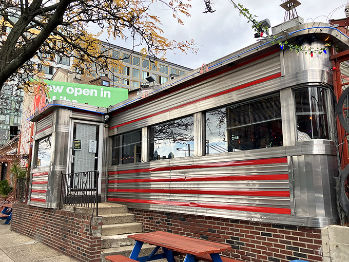 The gleaming stainless steel exterior with bold red stripes isn't just eye-catching&mdash;it's a time machine disguised as a diner in Philadelphia's Northern Liberties neighborhood.