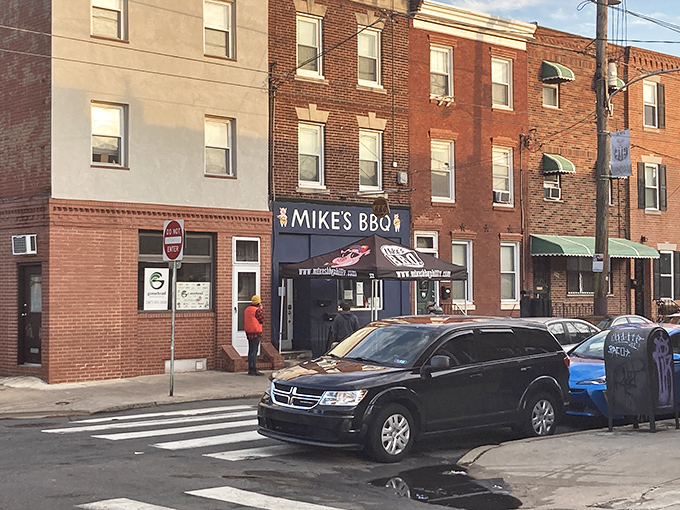 Mike's BBQ nestles into this unassuming South Philly row house like a well-kept secret, proving the best treasures often hide in plain sight.