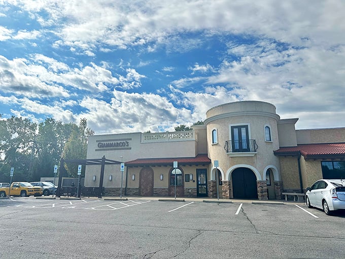 Bathed in daylight, Giammarco's architectural charm stands out with its distinctive curved walls, balcony details, and welcoming entrance that whispers "come hungry, leave happy."