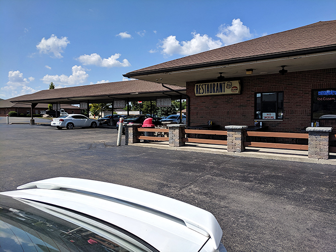The unassuming brick exterior of B & K Root Beer Stand in Troy might not scream "culinary destination," but locals know better. This humble drive-in houses flavor treasures worth the detour.