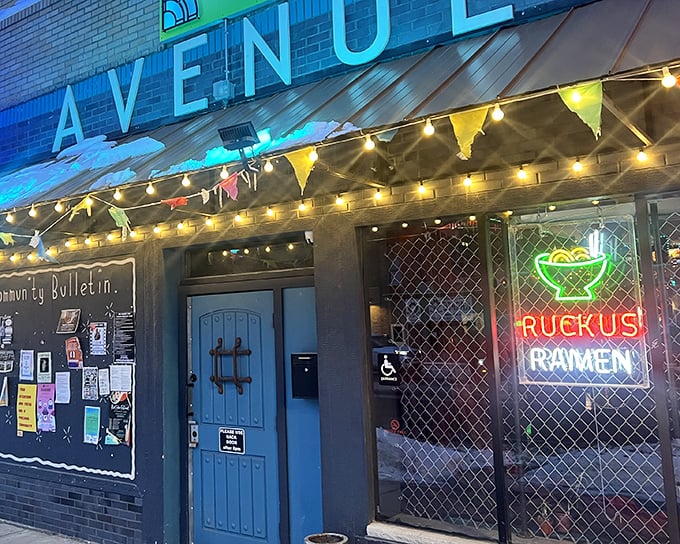 That blue door isn't just an entrance&mdash;it's a portal to noodle nirvana, complete with festive lights that say "yes, we're serious about fun AND food."