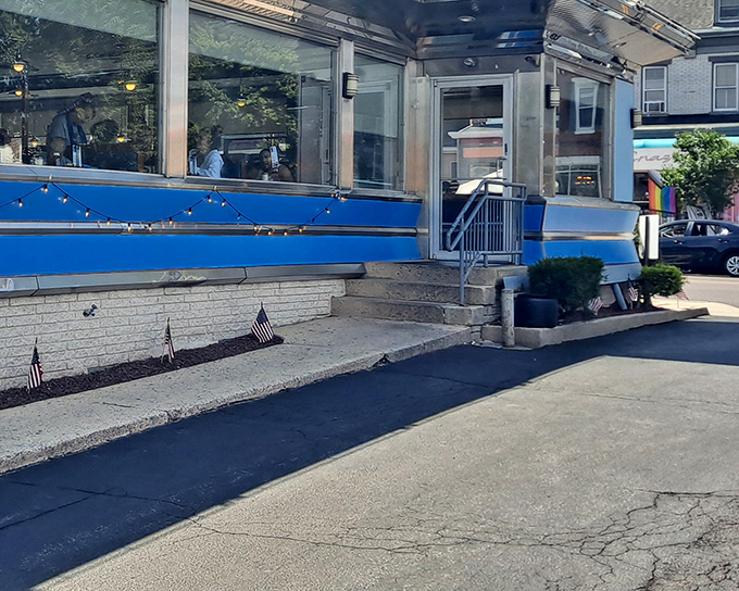 Small-town Americana at its finest&mdash;the blue trim and patriotic touches on this classic diner exterior invite you to step back in time for a meal worth remembering.