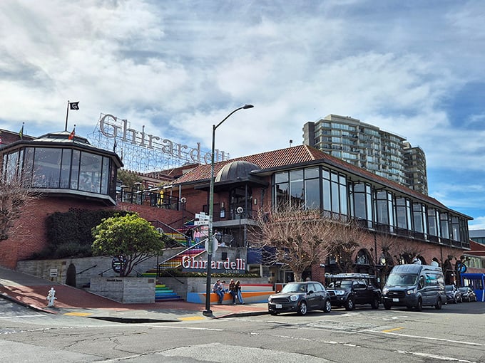 San Francisco's chocolate landmark beckons from the hillside, its iconic sign a beacon for sweet-toothed pilgrims since the Gold Rush days.