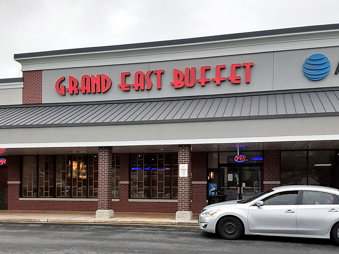 The bold red letters of Grand East Buffet beckon from this strip mall location like a lighthouse guiding hungry sailors to shore.