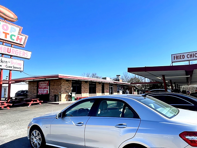 That iconic roadside sign and vintage drive-in canopy will make you slow down faster than spotting a speed trap.