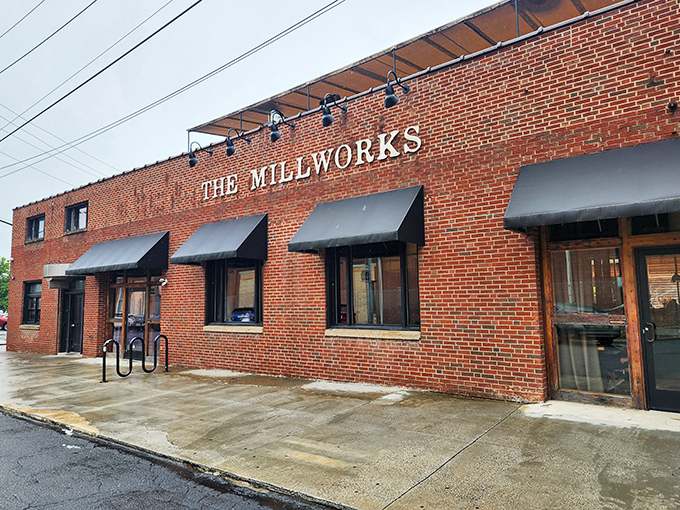 The brick facade of The Millworks stands as a testament to Harrisburg's industrial past, now transformed into a culinary playground for the present.