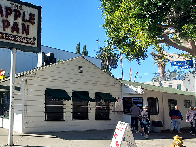 Time stands still at this West LA landmark, where the iconic red sign promises "Quality Forever" and actually delivers on that bold claim.