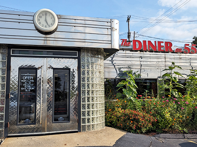 The gleaming stainless steel exterior with its vintage clock isn't just nostalgic architecture&mdash;it's a time portal to when diners ruled American highways.