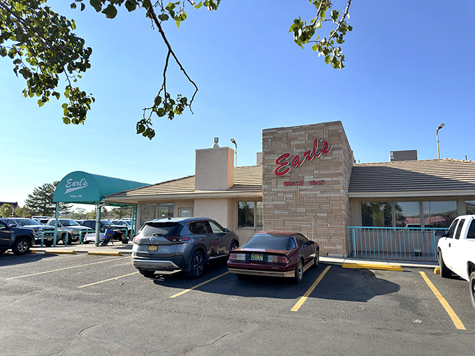 Earl's iconic turquoise awning welcomes hungry travelers like a desert oasis, promising comfort food salvation after miles of New Mexico highway.