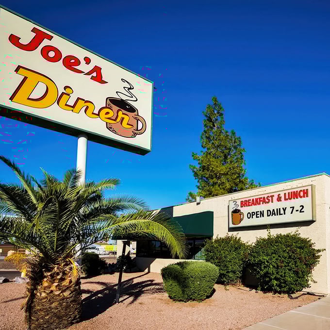 That iconic sign against the Arizona blue sky promises more than just breakfast&mdash;it's a beacon of hope for the hungry morning wanderer.