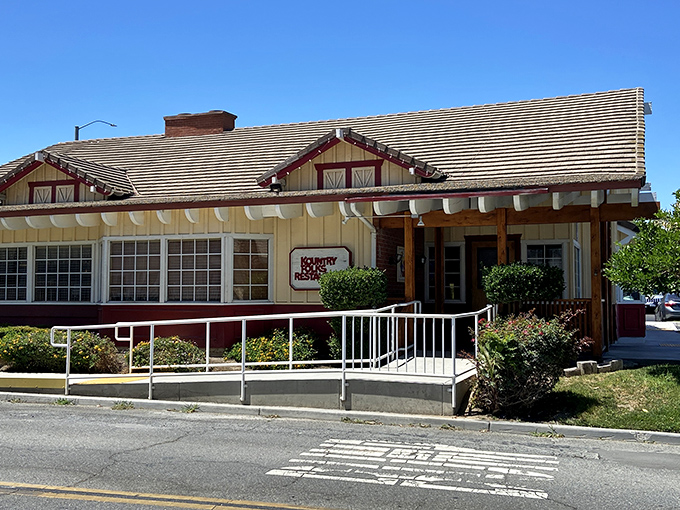 The charming cabin-like exterior of Kountry Folks beckons like a mirage in Riverside—a slice of country comfort that promises culinary hugs rather than handshakes.