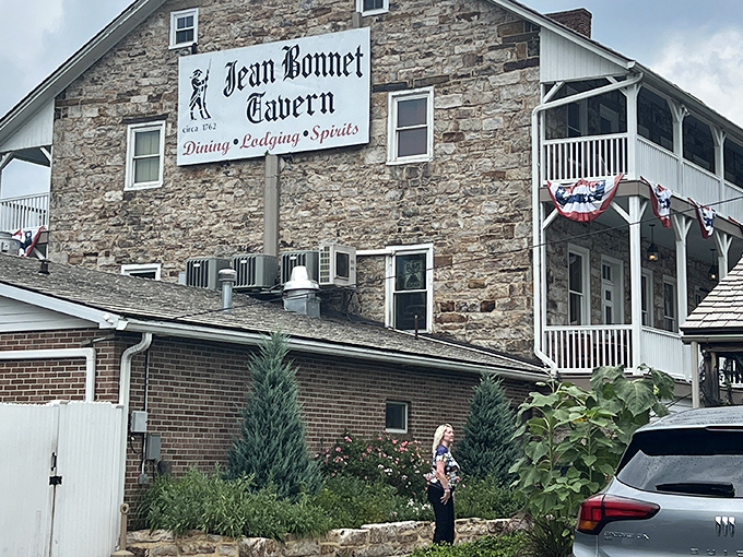 Stone walls that have witnessed centuries of American history stand proudly at Jean Bonnet Tavern, where colonial charm meets modern comfort in Bedford's countryside.