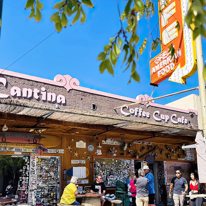 The iconic facade of The Coffee Cup Cafe stands proudly against the Nevada sky, its vintage sign promising "Great American Food" &ndash; a promise it keeps with delicious authority.