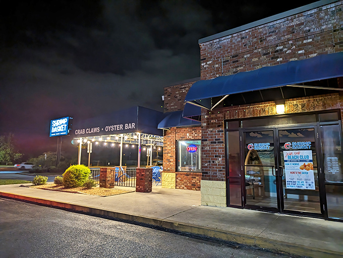 That blue awning isn't just decoration—it's a beacon calling you home to some seriously good Gulf Coast eating.