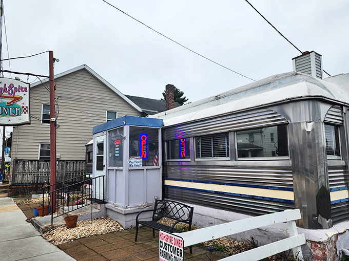 Another angle reveals the diner's vintage charm, complete with the iconic neon sign that's been beckoning hungry travelers for generations.