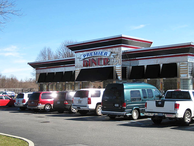 That classic diner glow beckons like a lighthouse for hungry souls seeking breakfast salvation.