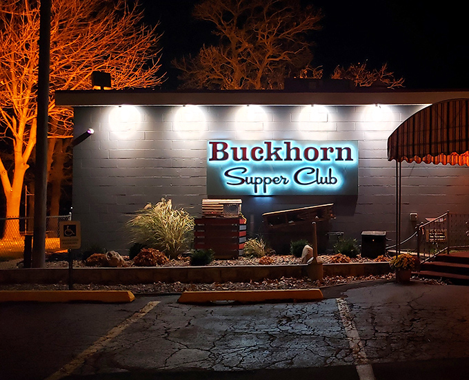 The neon glow of the Buckhorn sign beckons hungry travelers like a lighthouse for the famished. Wisconsin's supper club tradition lives on in illuminated glory.