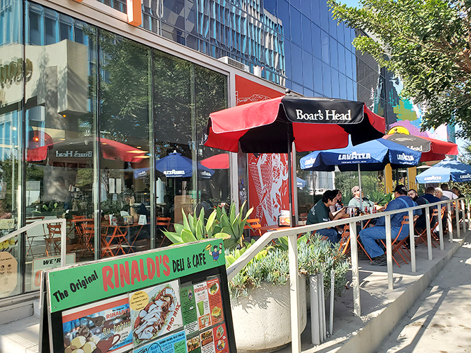 The modern glass exterior with bright orange "6171" signage promises what lies within: sandwich nirvana waiting to be discovered.