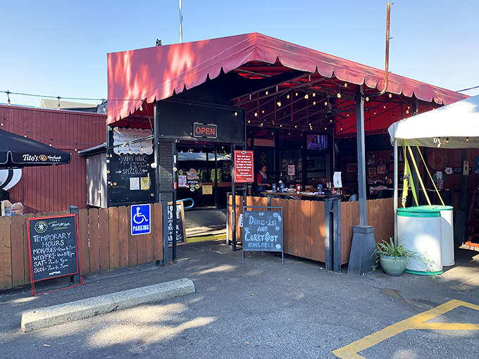 The iconic red awning beckons like a culinary lighthouse, guiding hungry souls to donut paradise in Grandview Heights.