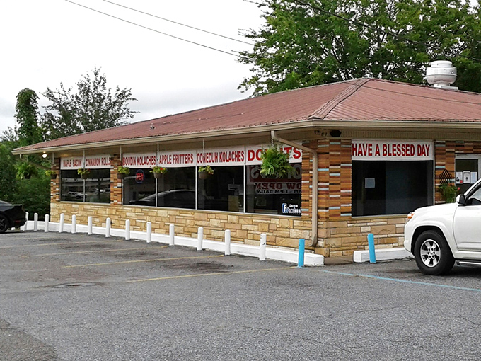 The unassuming brick exterior of Lickin' Good Donuts beckons with its cheerful "HAVE A BLESSED DAY" message&mdash;proof that culinary treasures often hide in plain sight.