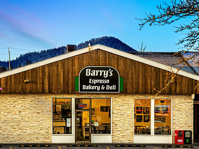 Where breakfast dreams come true! Barry's rustic wooden exterior against Oregon's forested hills promises culinary magic within.