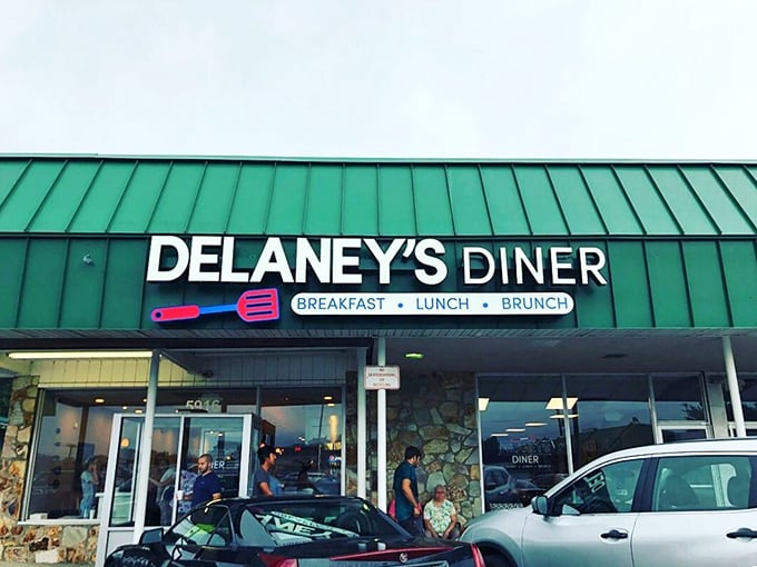 That iconic teal roof signals breakfast paradise ahead. Like a beacon for the breakfast-obsessed, Delaney's Diner stands ready to fulfill your morning dreams.