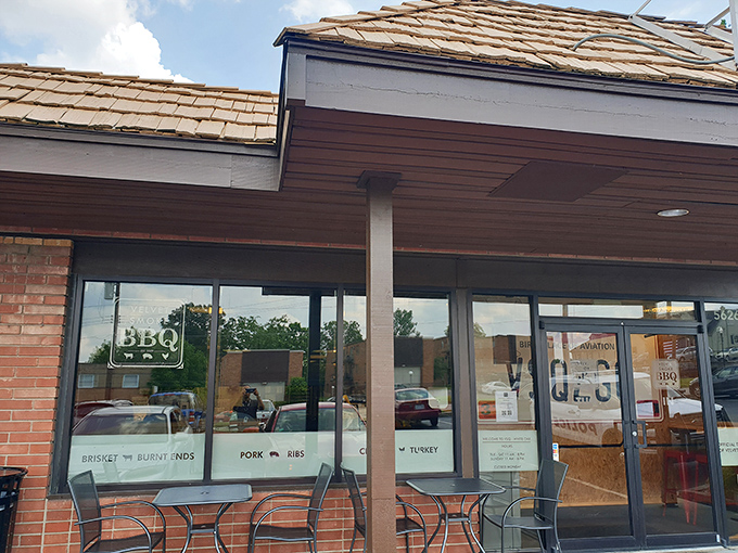 That modest storefront holds some serious BBQ secrets, like a delicious spy operation hiding in plain sight.