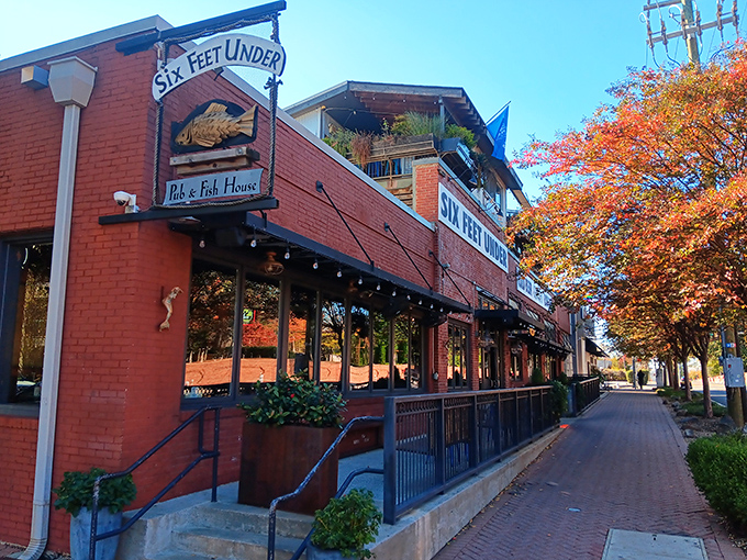 The iconic brick exterior of Ria's Bluebird stands proudly on Memorial Drive, its blue accents and autumn foliage creating the perfect Atlanta breakfast backdrop.