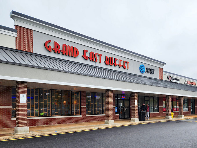 The bold red letters of Grand East Buffet beckon from this strip mall location like a lighthouse guiding hungry sailors to shore.