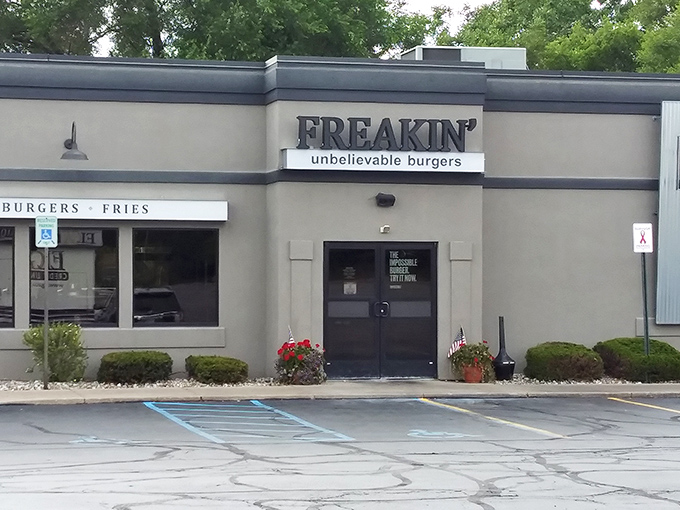 The unassuming exterior of Freakin' Unbelievable Burgers hides culinary treasures within, like finding a diamond in a strip mall setting.