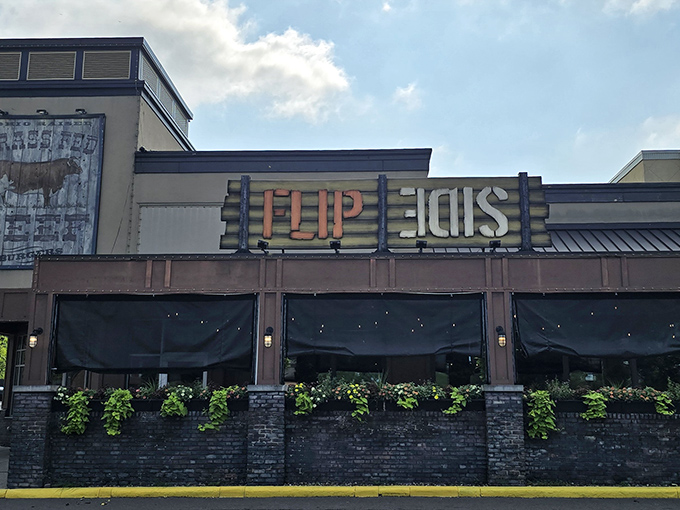 The iconic Flip Side sign beckons burger enthusiasts to Columbus's temple of grass-fed beef and creative culinary combinations.