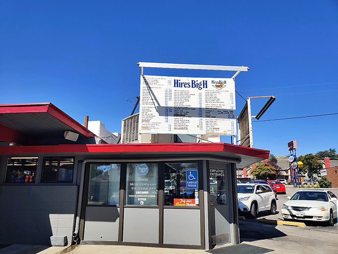The iconic Hires Big H sign stands tall against Utah's blue sky, a beacon of burger bliss that's been drawing hungry pilgrims for generations.