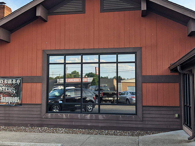 A closer look at the restaurant's distinctive reddish-brown siding &ndash; like the color of a perfect smoke ring on a well-tended brisket.