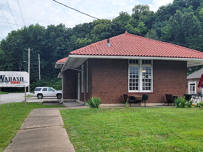 The historic brick building with its distinctive red-tiled roof stands as a delicious time capsule in Excelsior Springs, promising smoky treasures within.