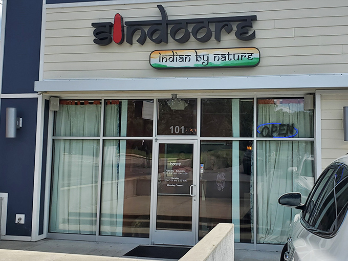 Sindoore's storefront beckons like a culinary lighthouse, promising safe harbor from boring dinner choices.